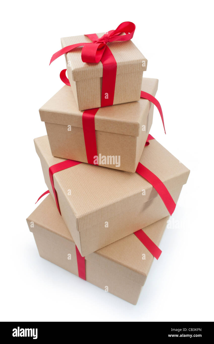 Stack of gift boxes of different sizes each tied with red ribbon Stock ...