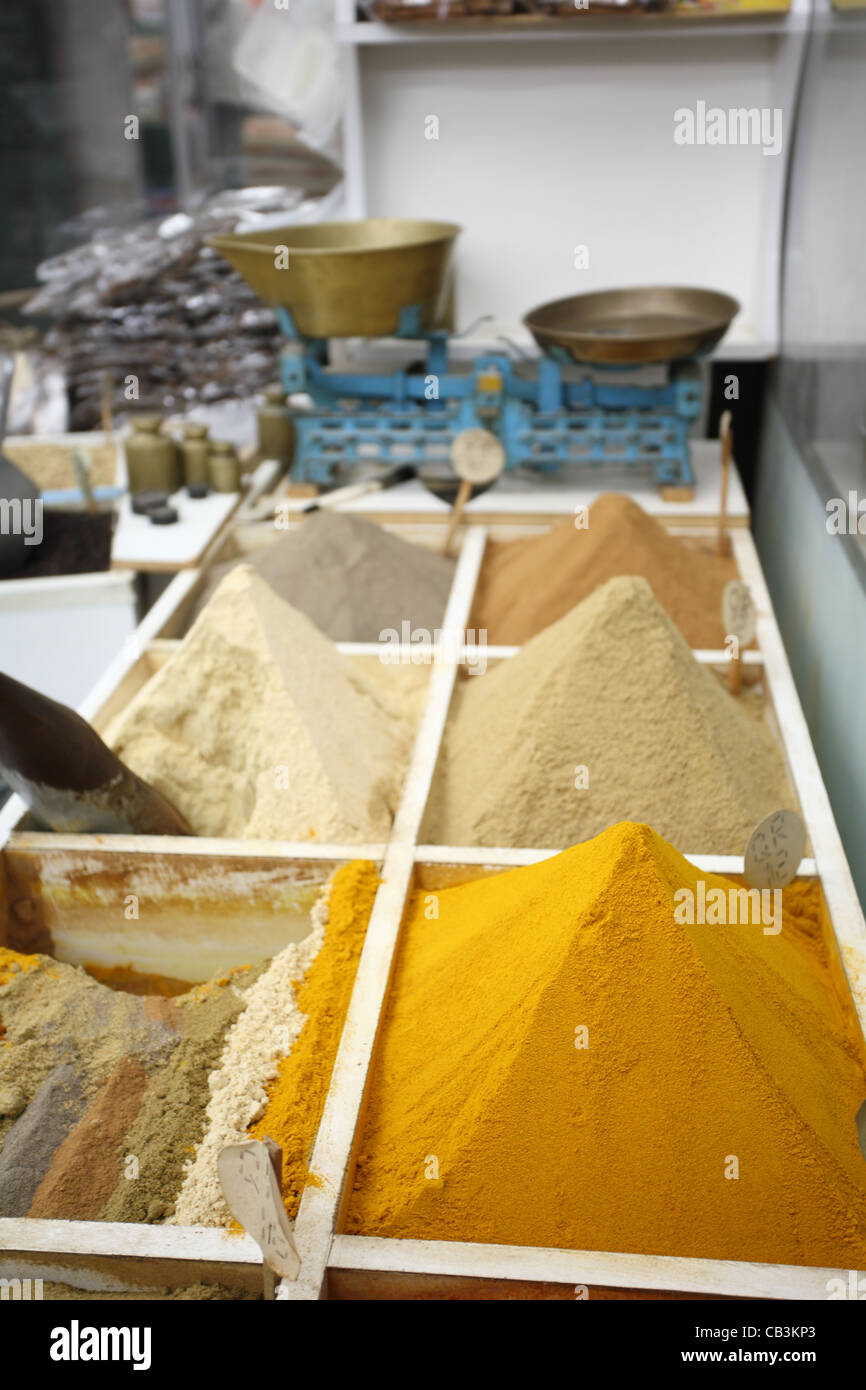 A display of loose spices sold by weight in Souq Waqif, Doha, Qatar ...