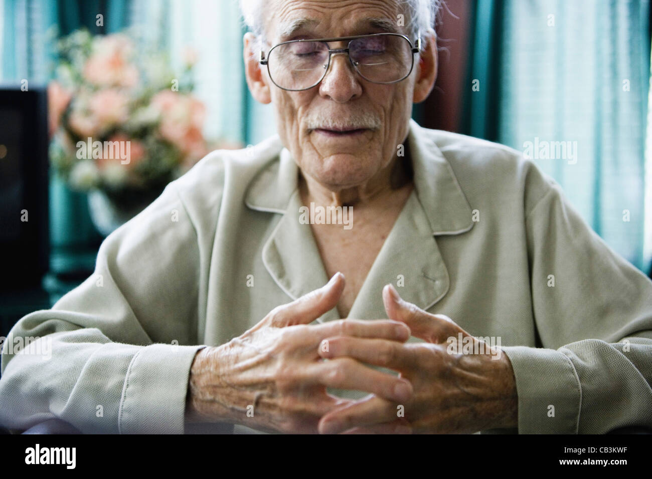 Close-up of a senior man dozing off Stock Photo - Alamy