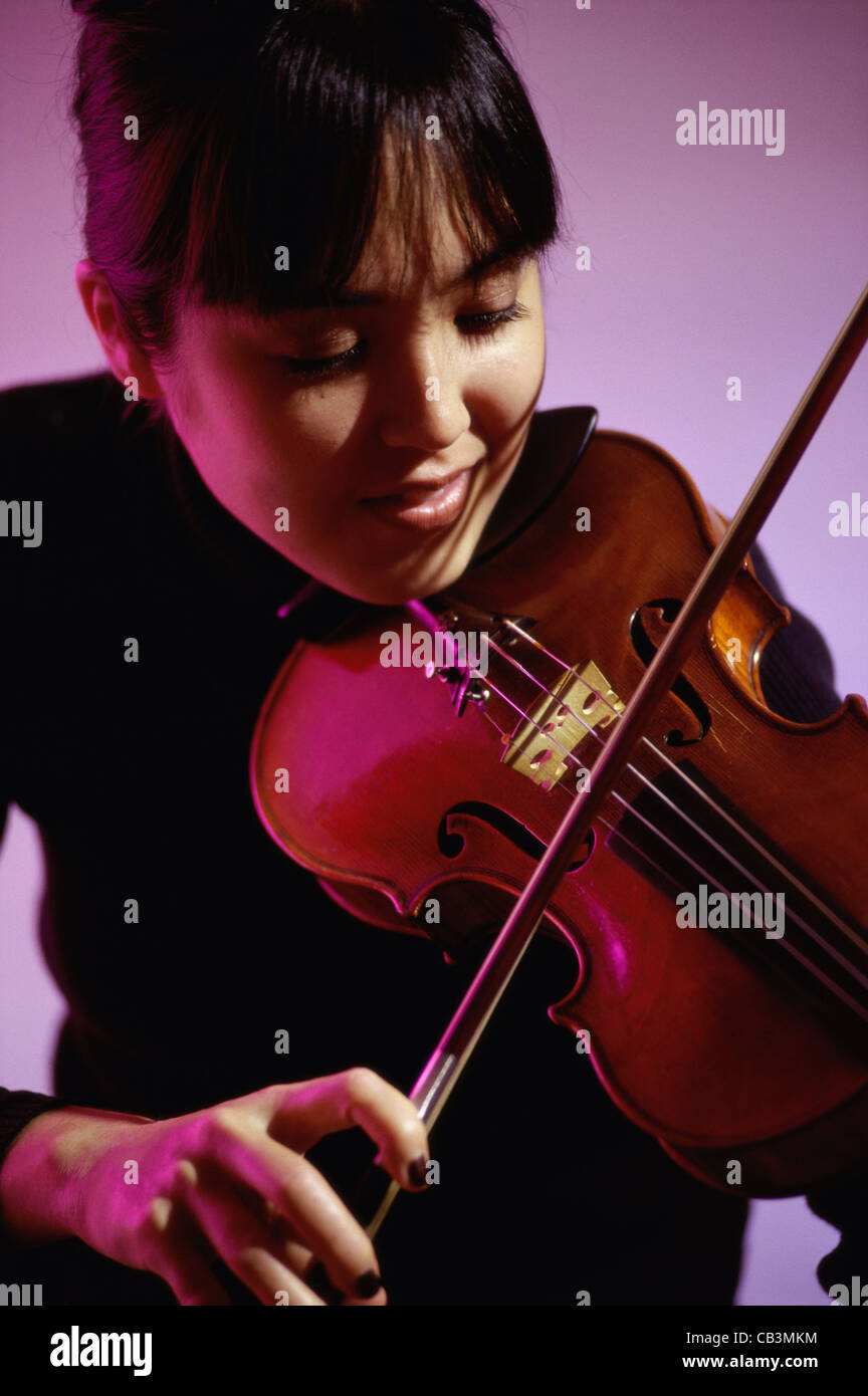 Woman back violin hi-res stock photography and images - Alamy