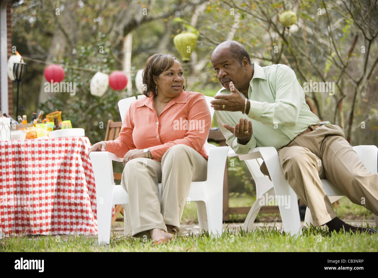 Next to table hi-res stock photography and images - Alamy
