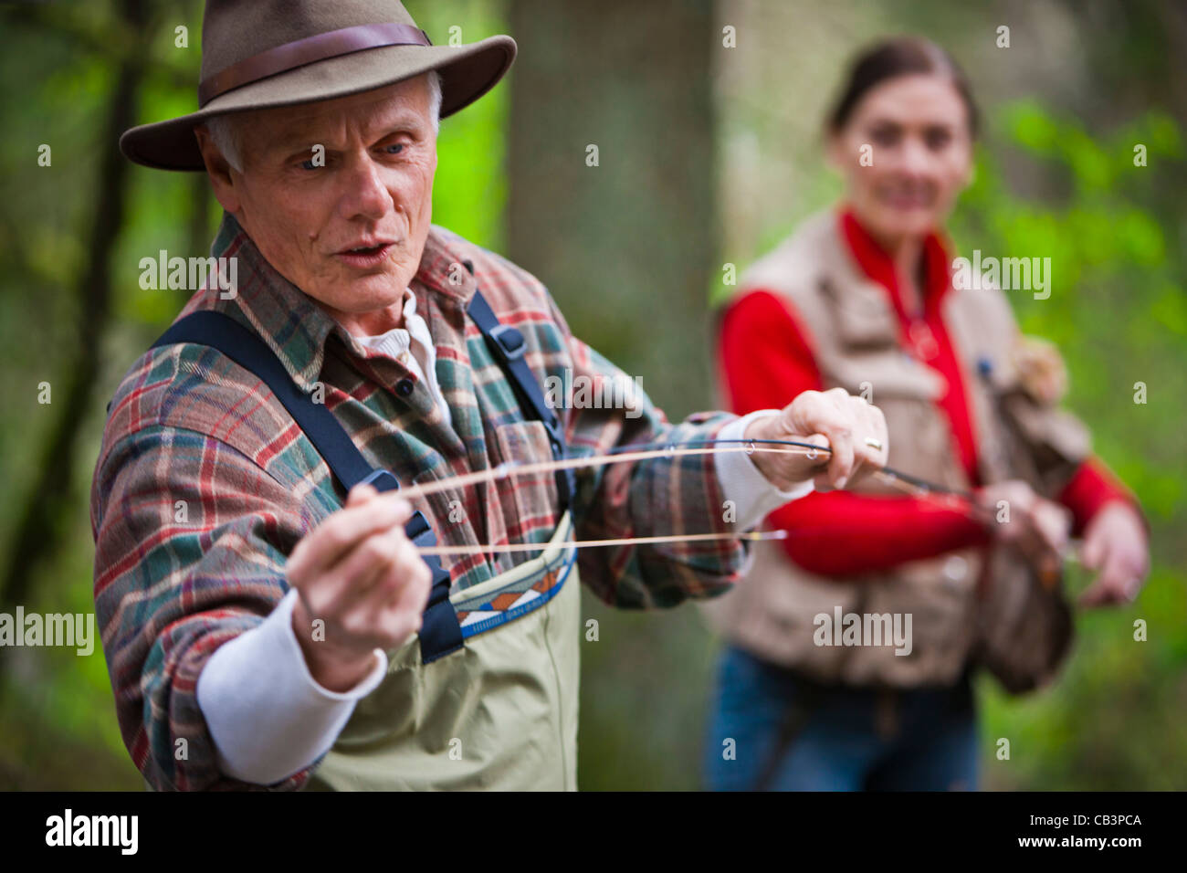 USA, Washington, Vancouver, Couple getting ready for fishing Stock ...