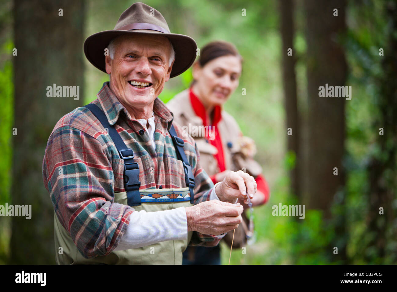 USA, Washington, Vancouver, Couple getting ready for fishing Stock ...