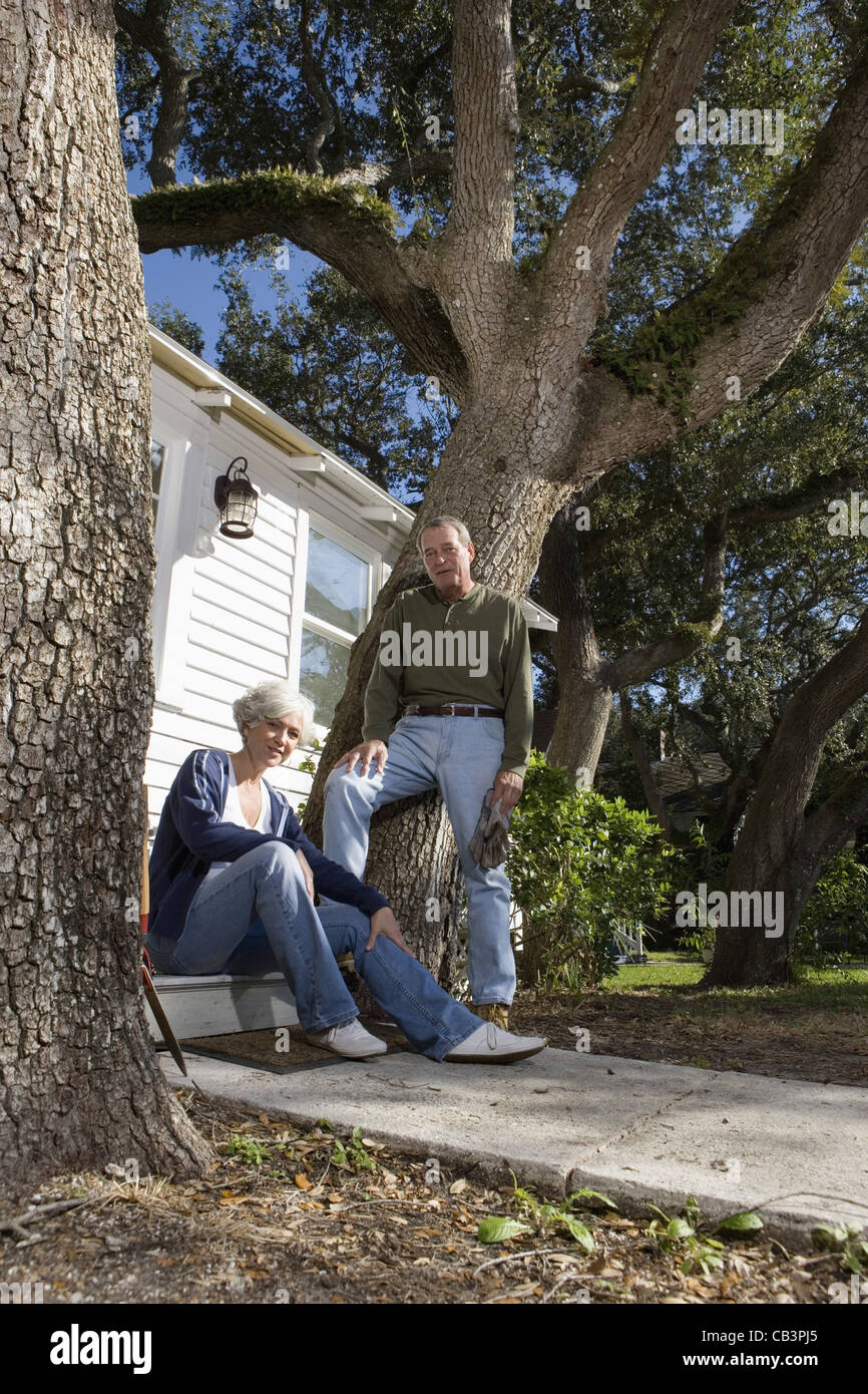 Man sitting under oak tree hi-res stock photography and images - Alamy