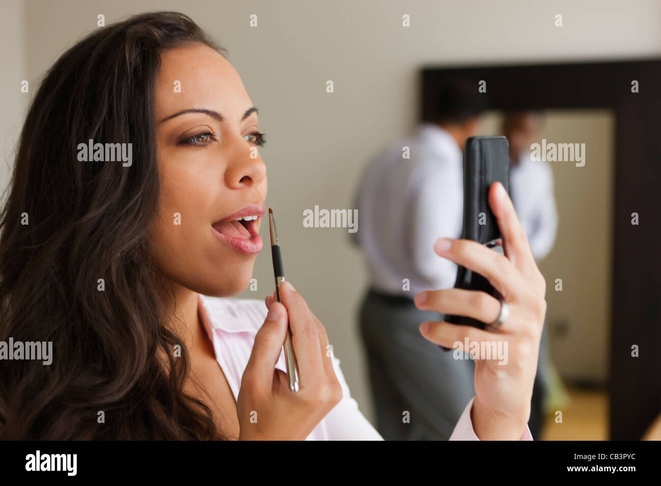 Couple getting ready in morning Stock Photo - Alamy