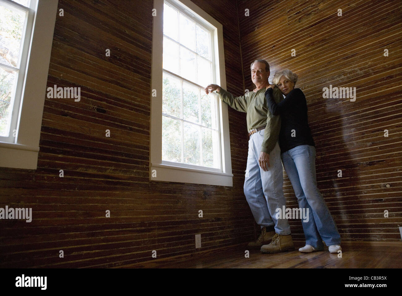 Couple gazing out a window hi-res stock photography and images - Alamy