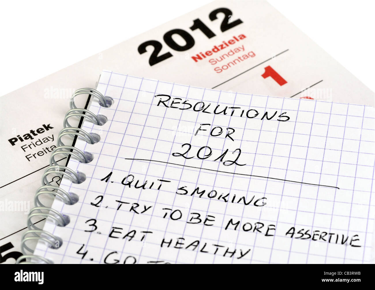 New Year's resolutions listed in the notepad Stock Photo - Alamy