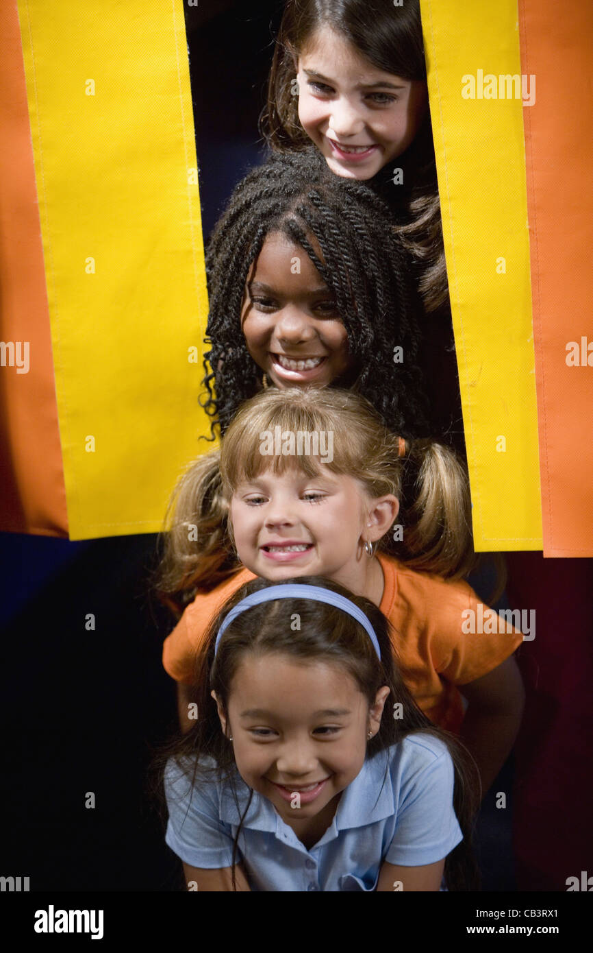 Kids heads from behind hi-res stock photography and images - Alamy