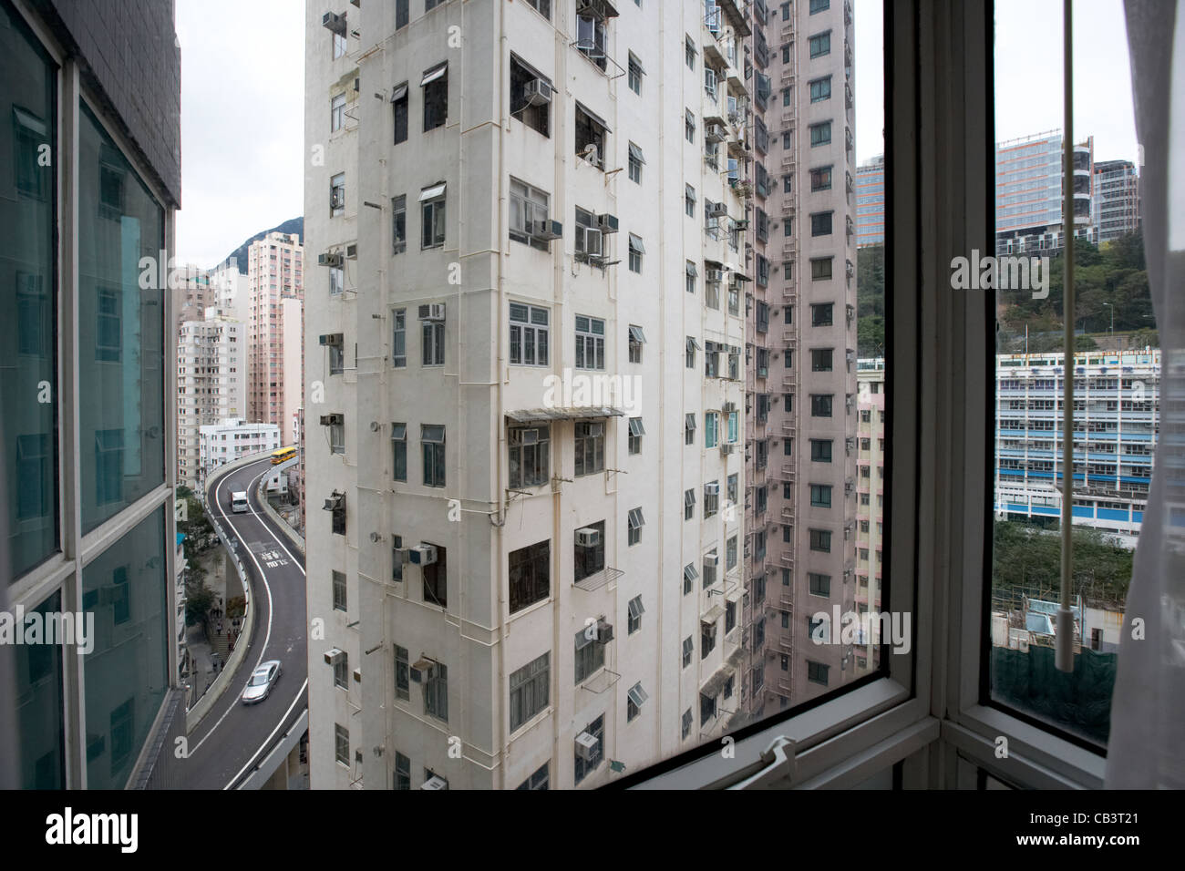 City apartments through window hi-res stock photography and images - Alamy