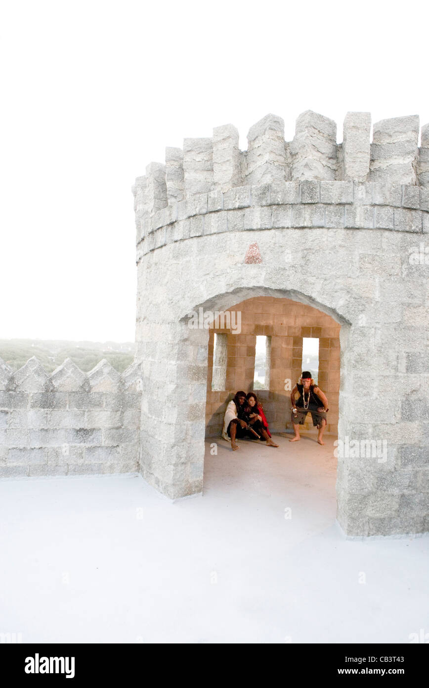 Pirates sitting on the ground inside a castle turret Stock Photo - Alamy