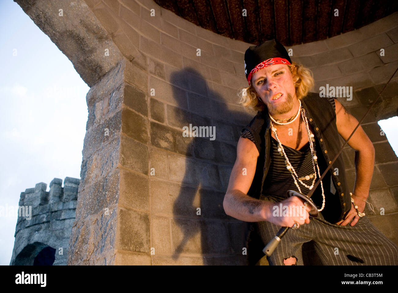 Portrait of a pirate armed with a sword inside a castle turret Stock ...