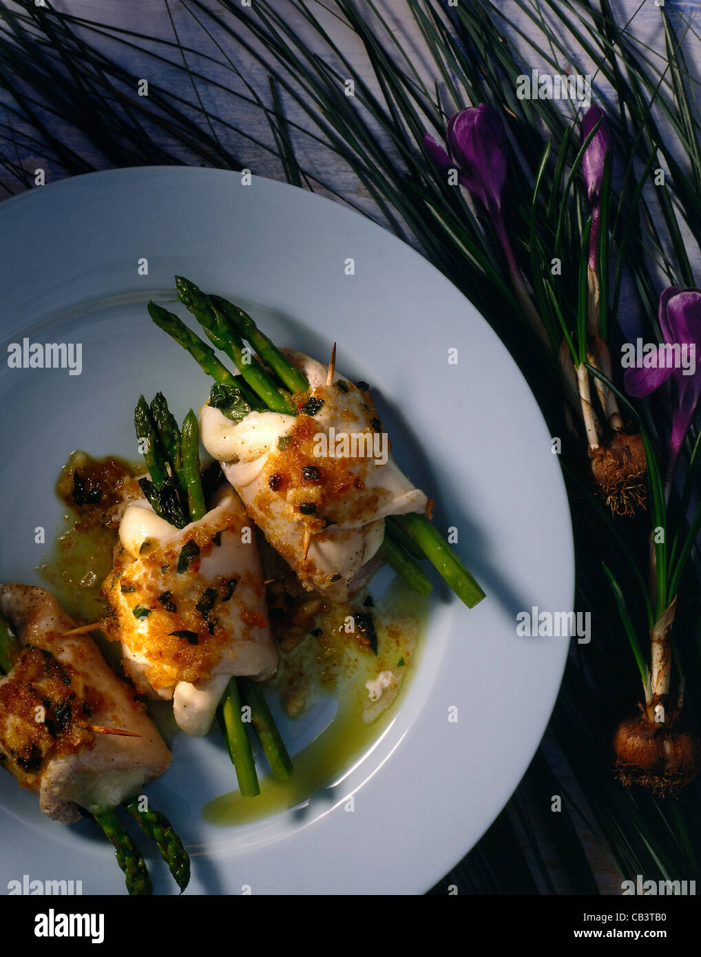 Asparagus turkey involtini au gratin Stock Photo - Alamy