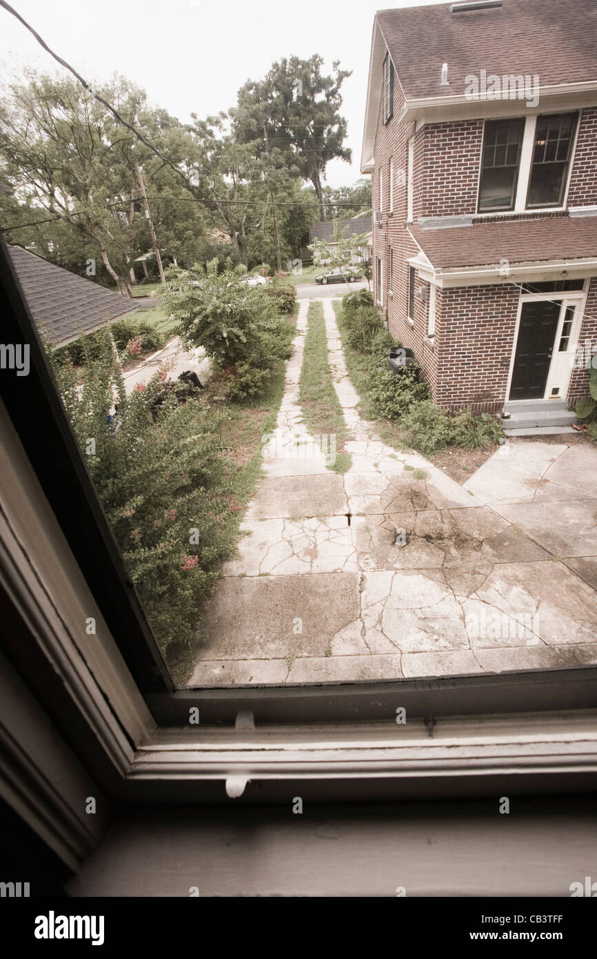 View of a neighboring house through a window Stock Photo - Alamy