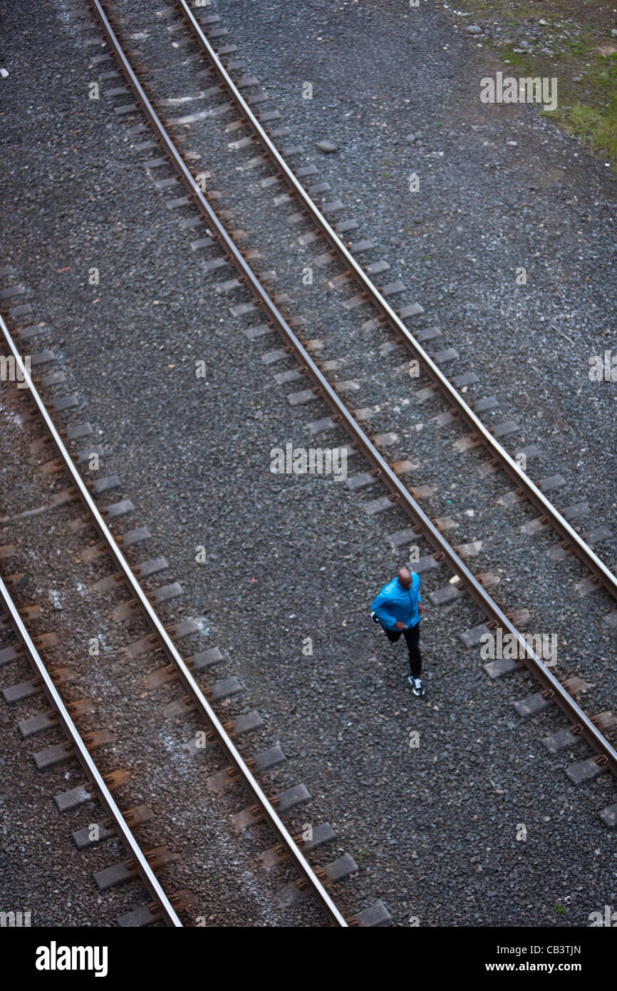 Man running railroad tracks hi-res stock photography and images - Alamy