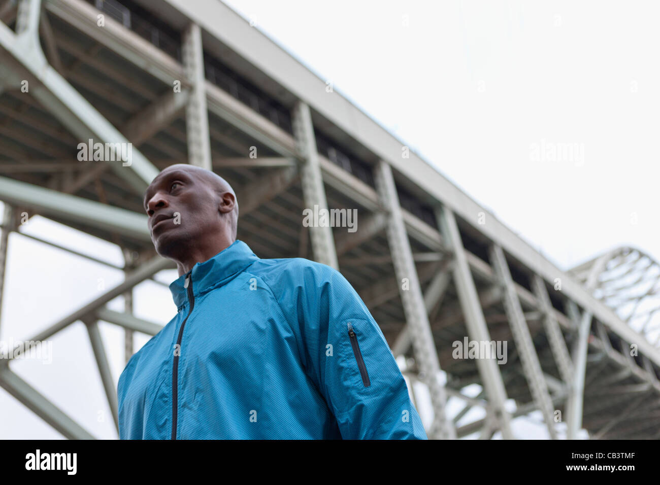 Person standing on a bridge hi-res stock photography and images - Alamy