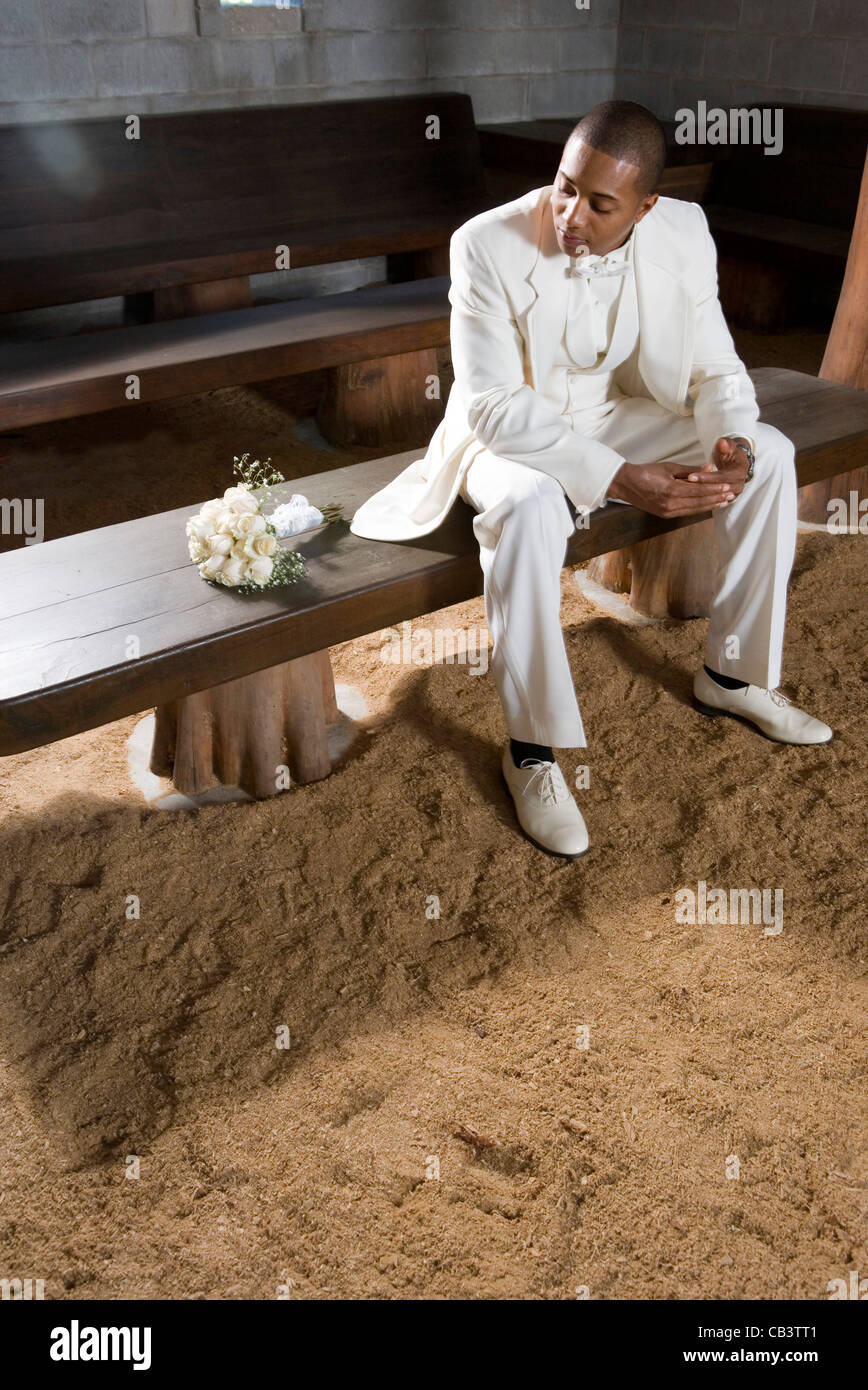 Portrait groom sitting alone on hi-res stock photography and images - Alamy
