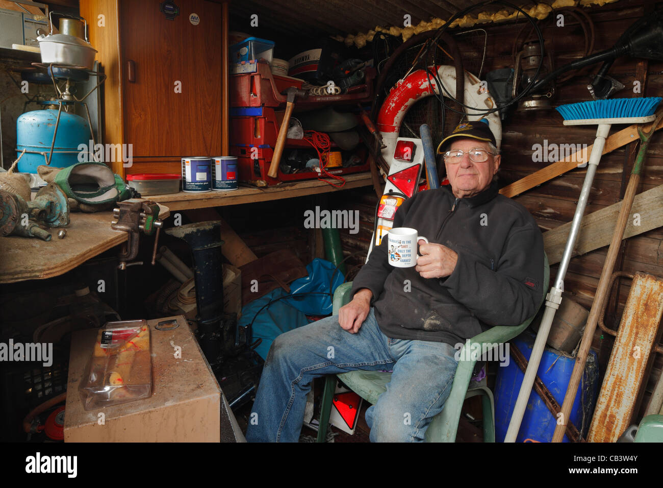 Senior man in his shed Stock Photo - Alamy