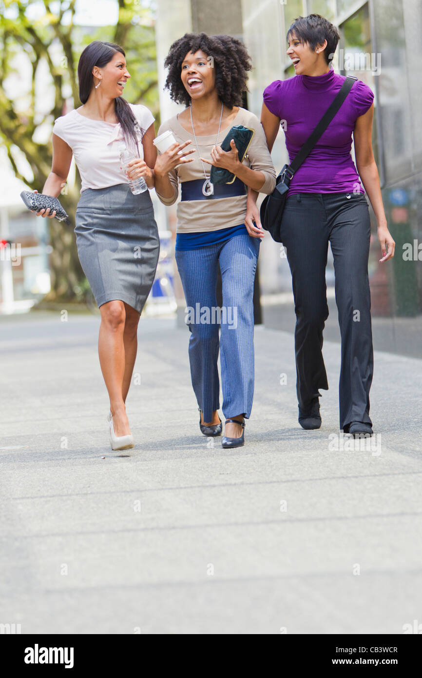 Coffee break walk office smile hi-res stock photography and images - Alamy