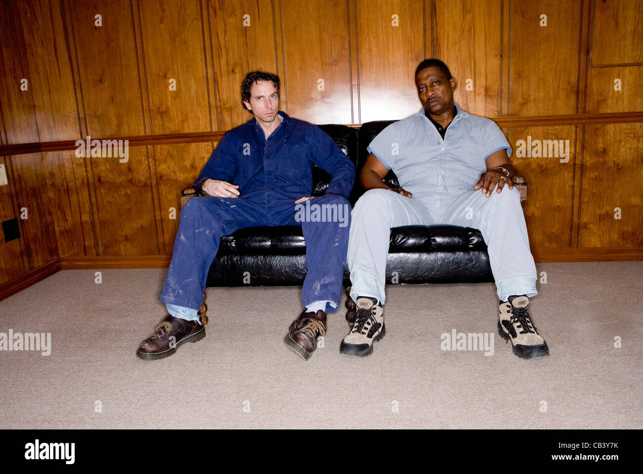Men in uniforms sitting hi-res stock photography and images - Alamy