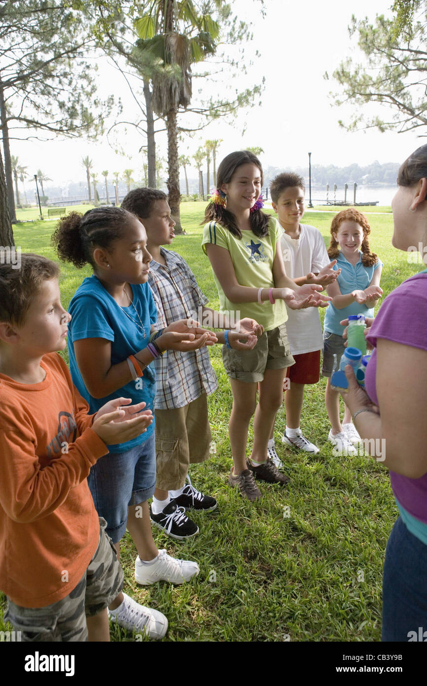 Children waiting in line outside hi-res stock photography and images ...