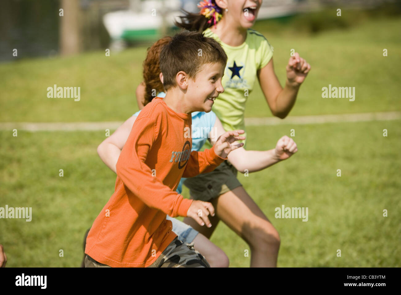 Children running and having fun outdoors Stock Photo - Alamy