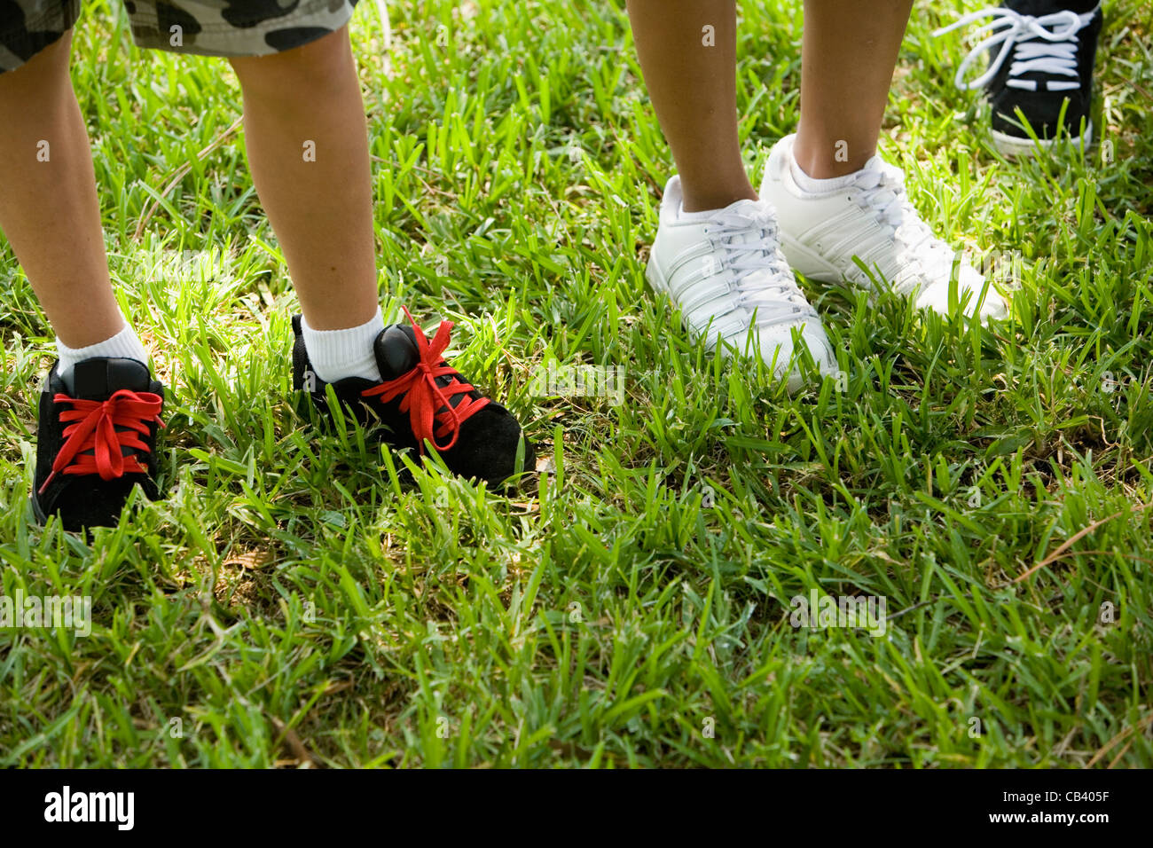 Close up Of Children s Shoes Standing On Grass Stock Photo Alamy close-up-of-children-s-shoes-standing-on-grass-stock-photo-alamy