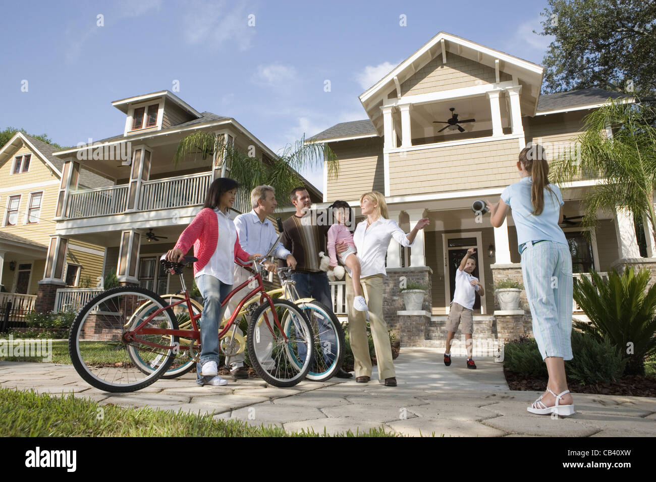 Couples standing in front of their houses hi-res stock photography and ...