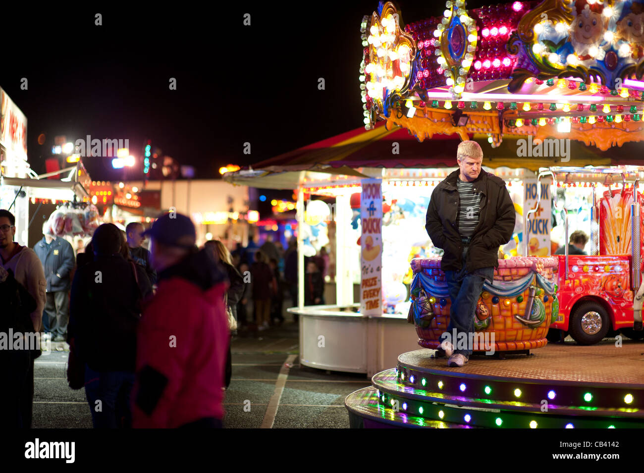 Fairground ride man hi-res stock photography and images - Alamy