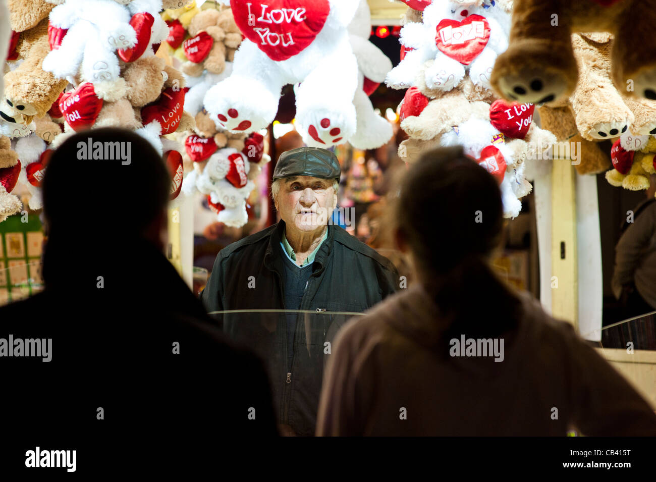 A Stallholder working at the Aberystwyth annual November funfair ...