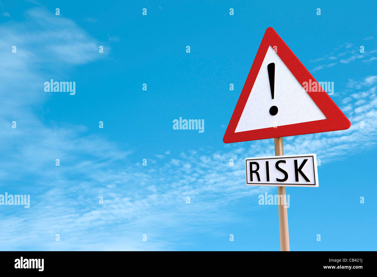3D composing of risk traffic sign in front of blue sky Stock Photo - Alamy