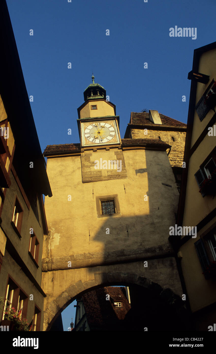 Germany, Rothenburg, clock tower in Market Place with traditional ...
