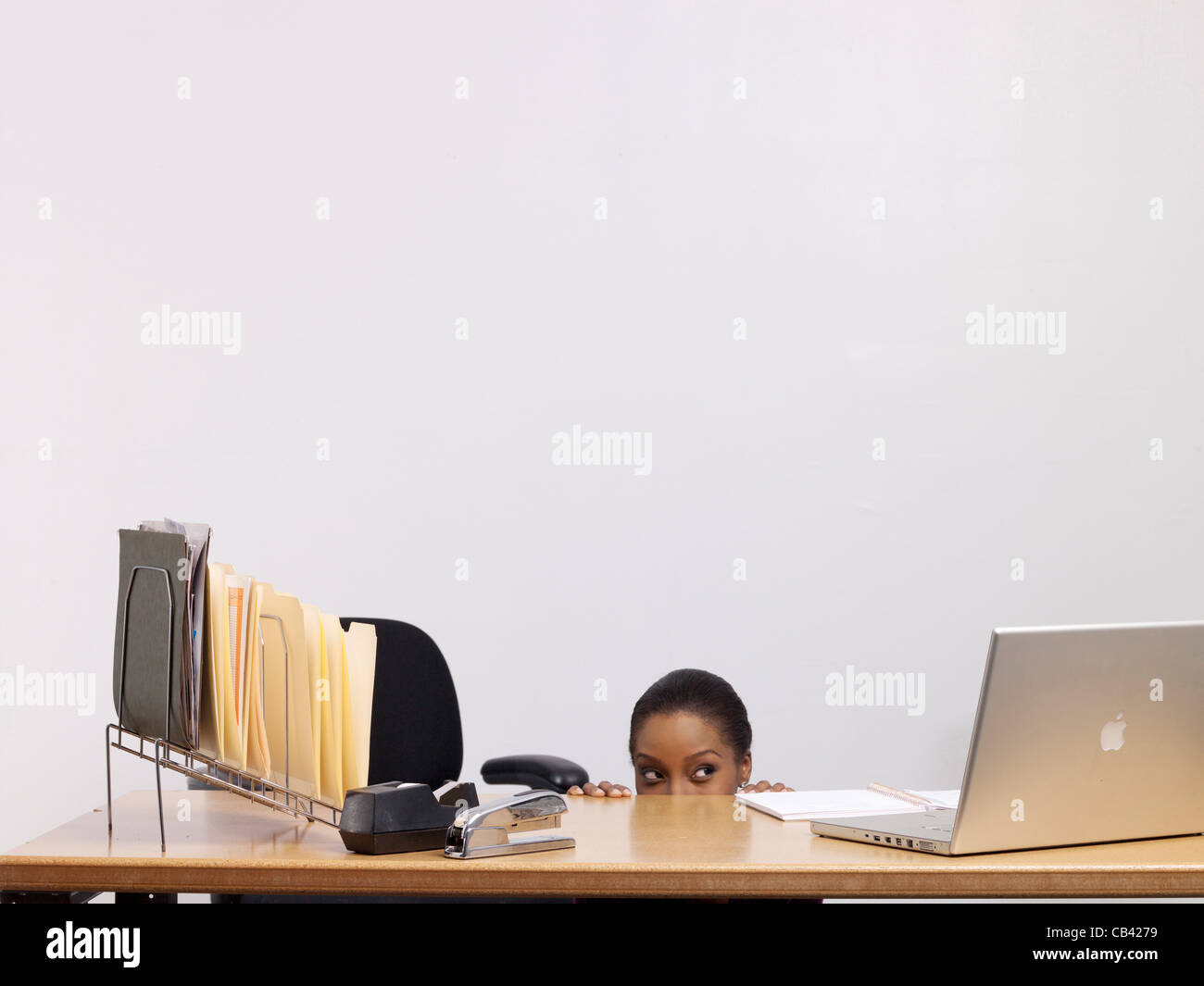 Woman shy office desk hi-res stock photography and images - Alamy