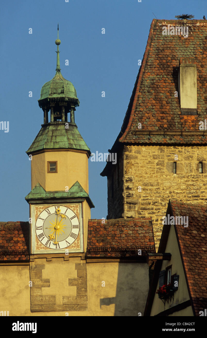 Germany, Rothenburg, clocktower in Market Square with traditional ...