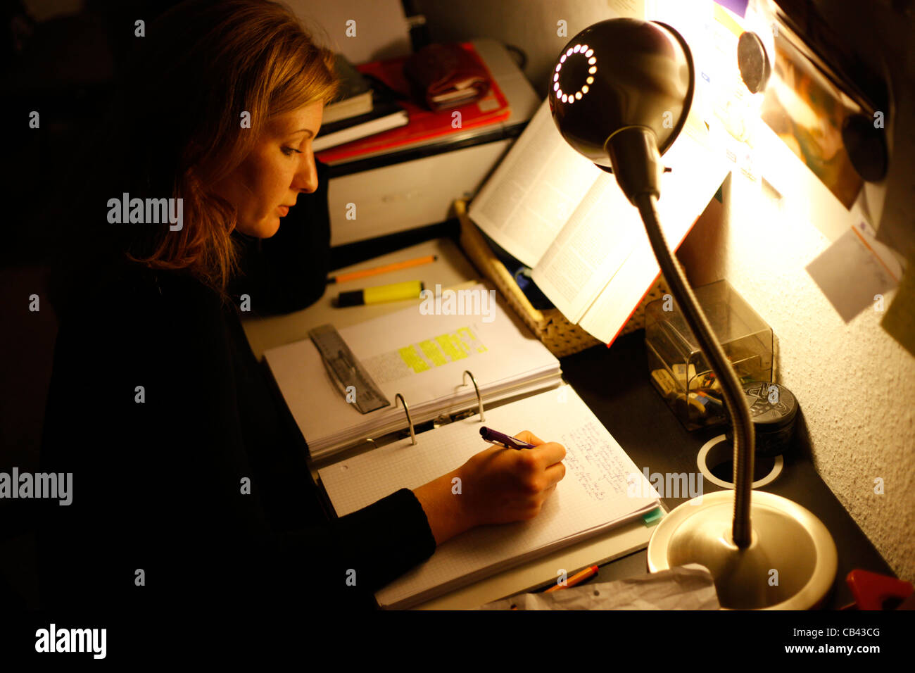 A German student studying at her flat Germany Stock Photo - Alamy