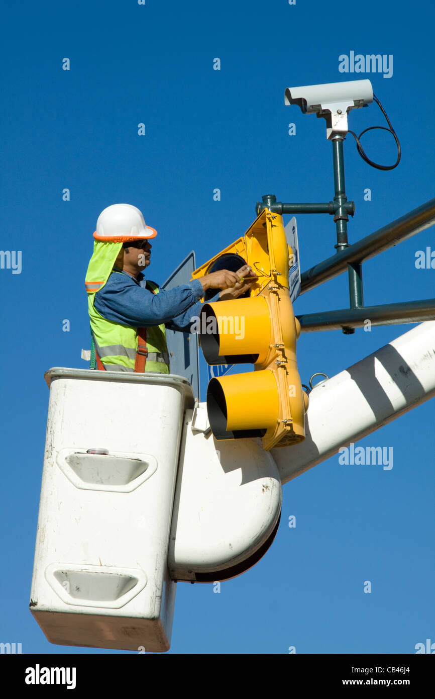 Man on Elevated Cherry Picker Fixing Traffic Lights San Antonio Texas ...