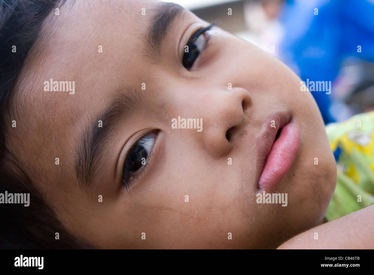 A hungry street child boy living in poverty is in need of food on the ...