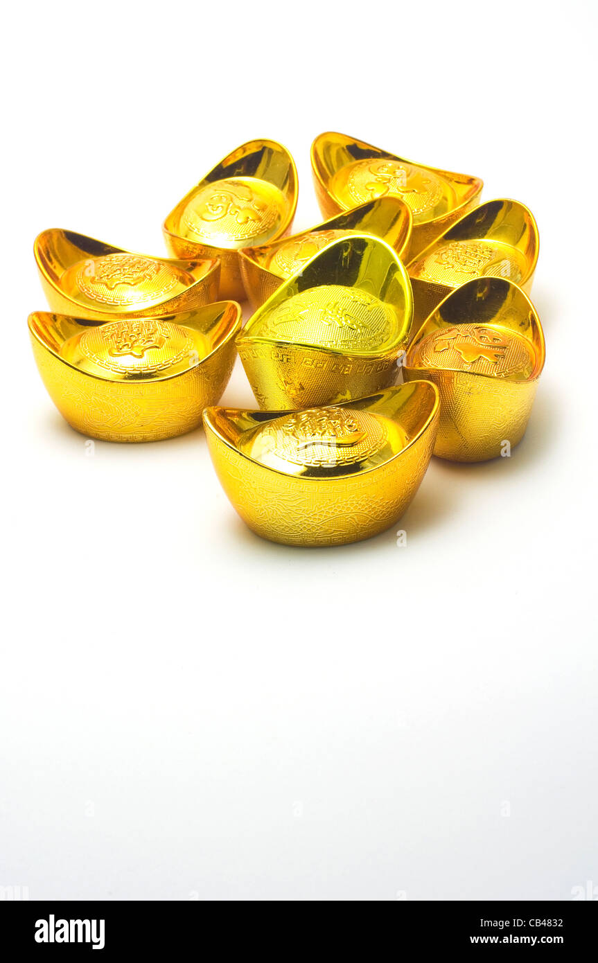 chinese gold ingots, a symbol of wealth for chinese Stock Photo - Alamy