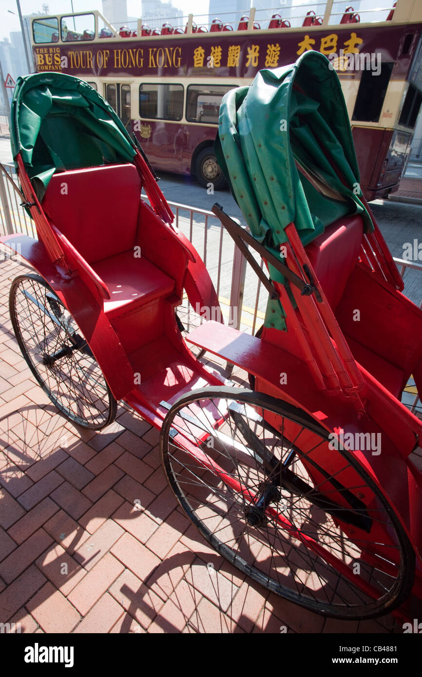 China, Hong Kong, Rickshaws and Tourist Bus Stock Photo - Alamy