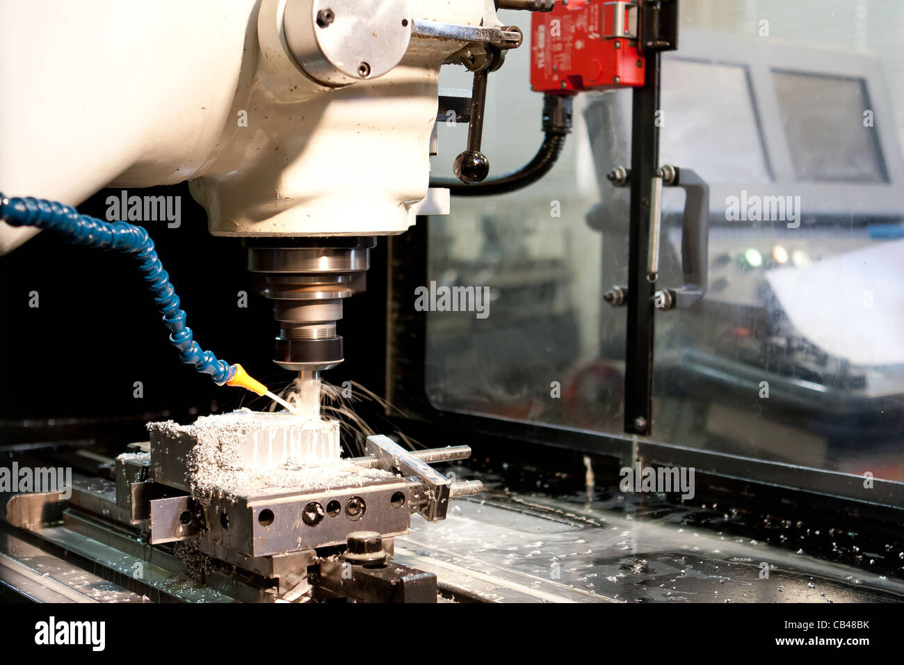 Engineering technician, Engineer working a CNC milling machine Stock ...