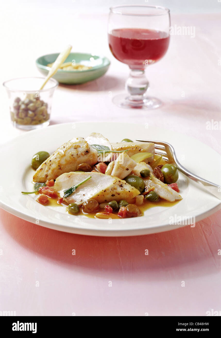 Rabbit ragout (Coniglio all´agrodolce Stock Photo - Alamy
