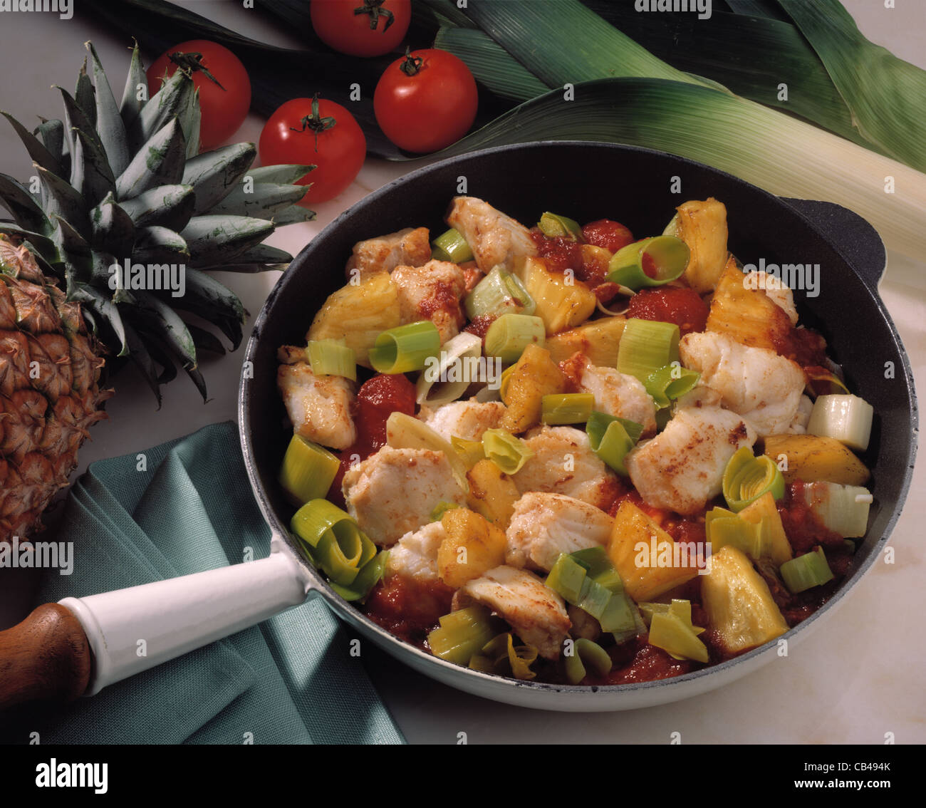 Fried fish with pineapple Stock Photo - Alamy