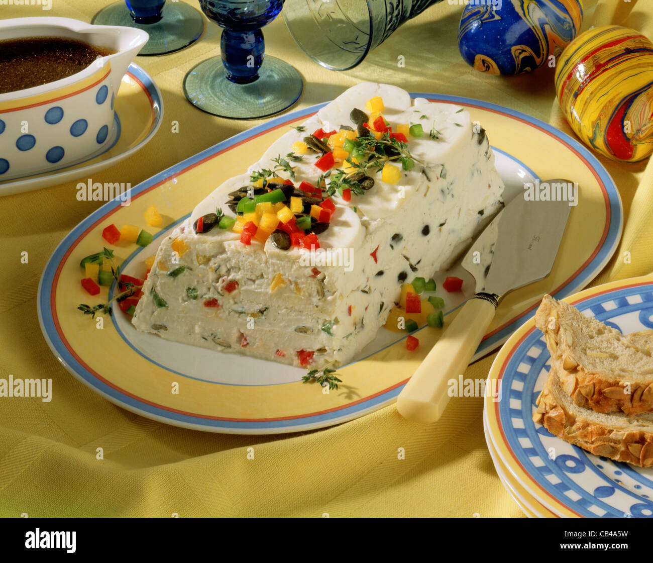 Cheese - tureen with sweet pepper cubes Stock Photo - Alamy