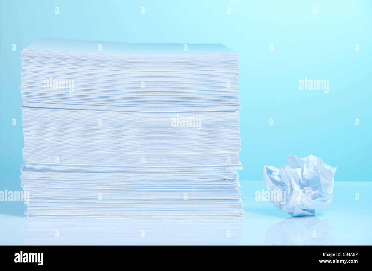 Pile of paper and small crumpled paper sheet Stock Photo - Alamy