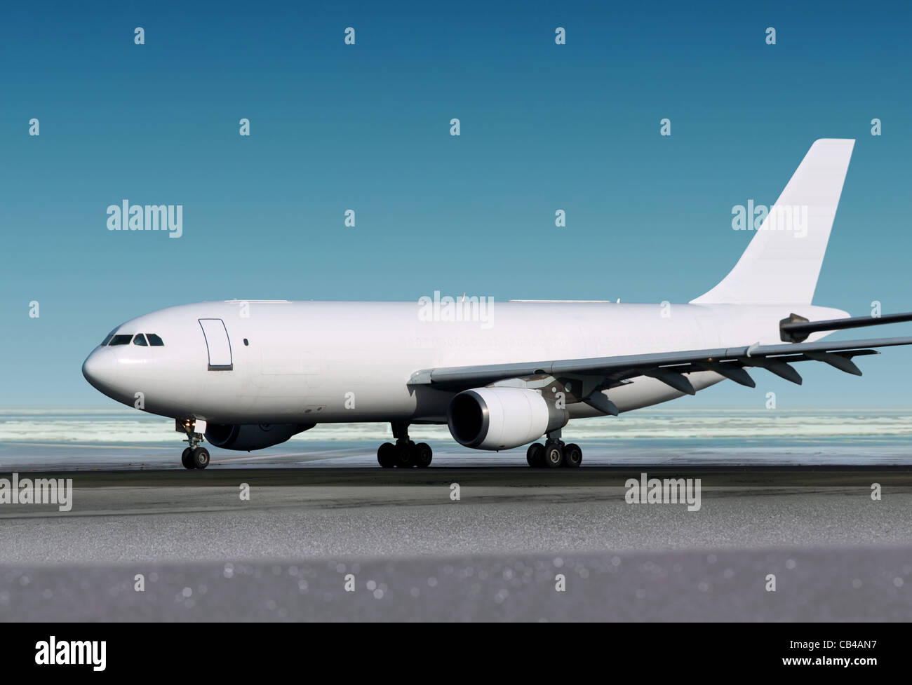 small cargo airplane is landing to runway of airport Stock Photo - Alamy