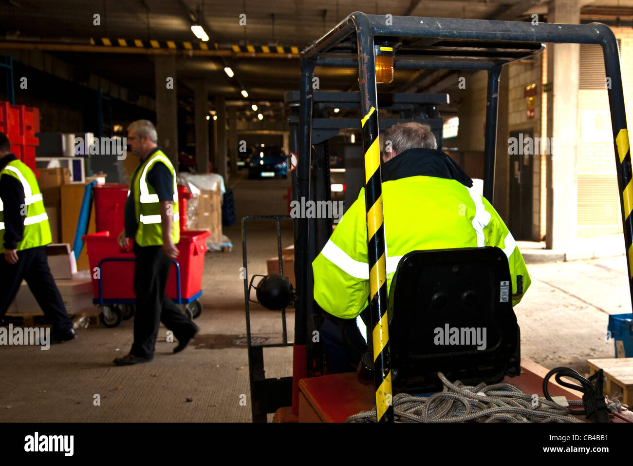 Forklift Truck in Operation in Loading Bay Stock Photo - Alamy