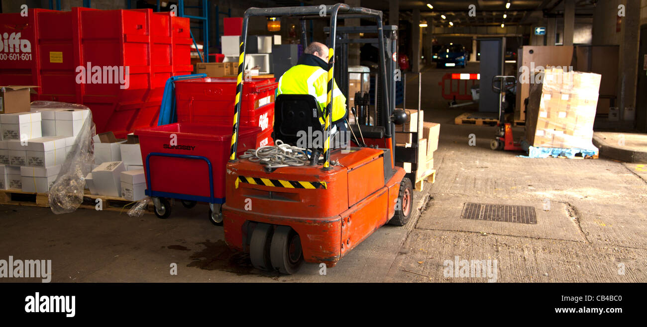 Forklift Truck in Operation in Loading Bay Stock Photo - Alamy