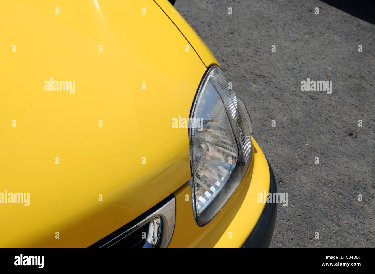Yellow car front corner with lamp Stock Photo - Alamy