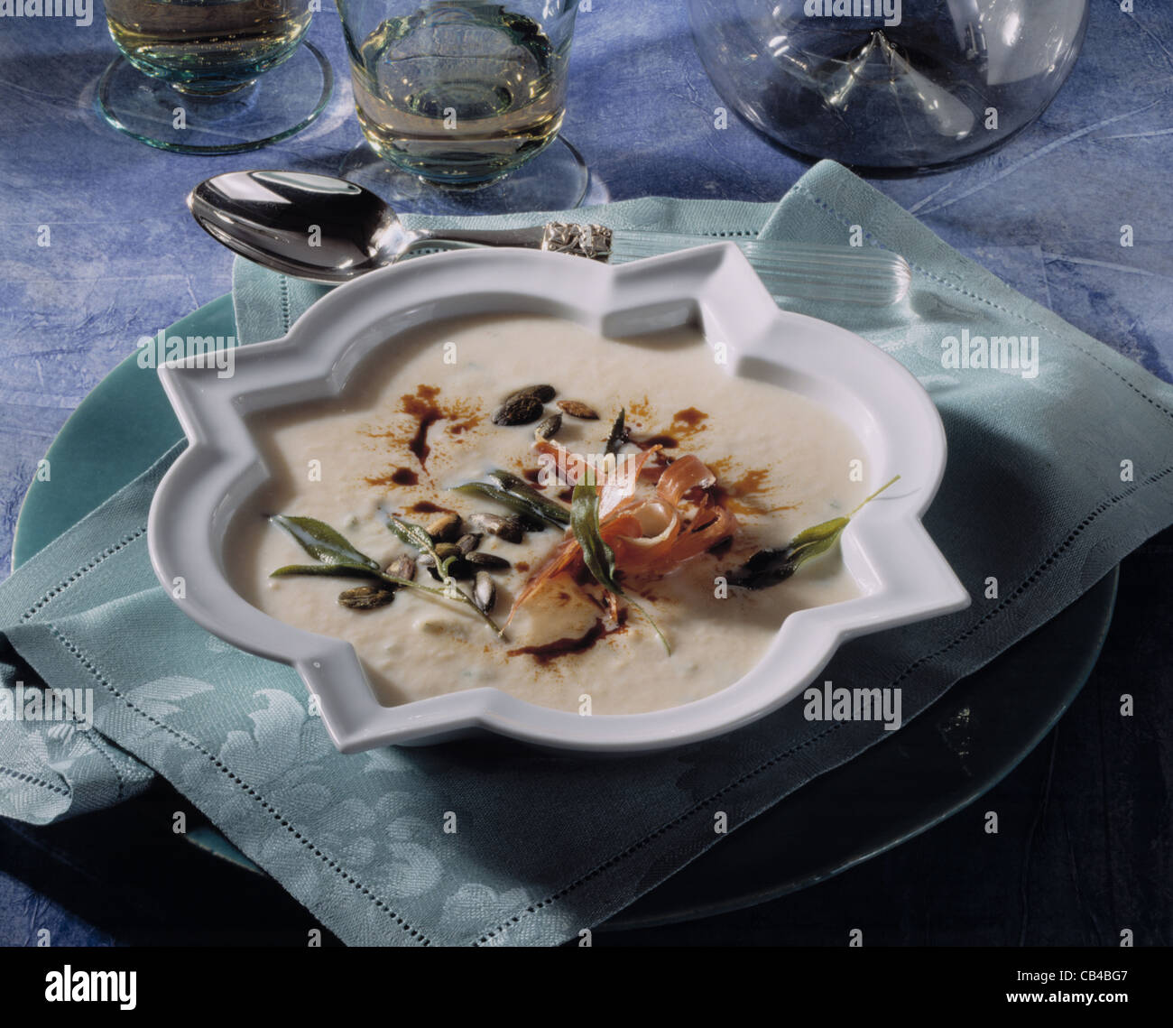 Celery - cream soup with parma ham Stock Photo - Alamy