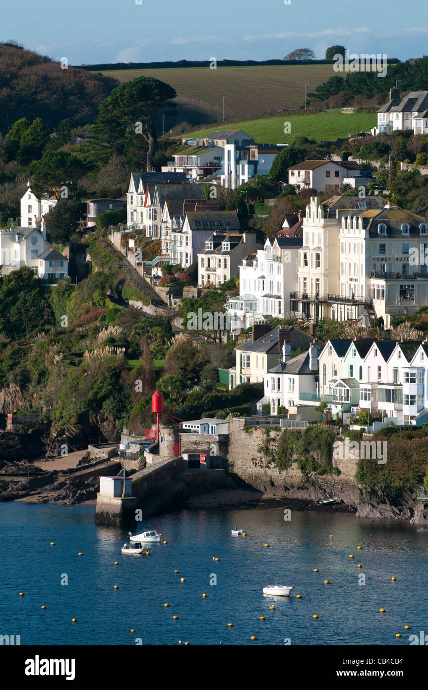Houses run up the hill overlooking the river on the south side of Fowey ...