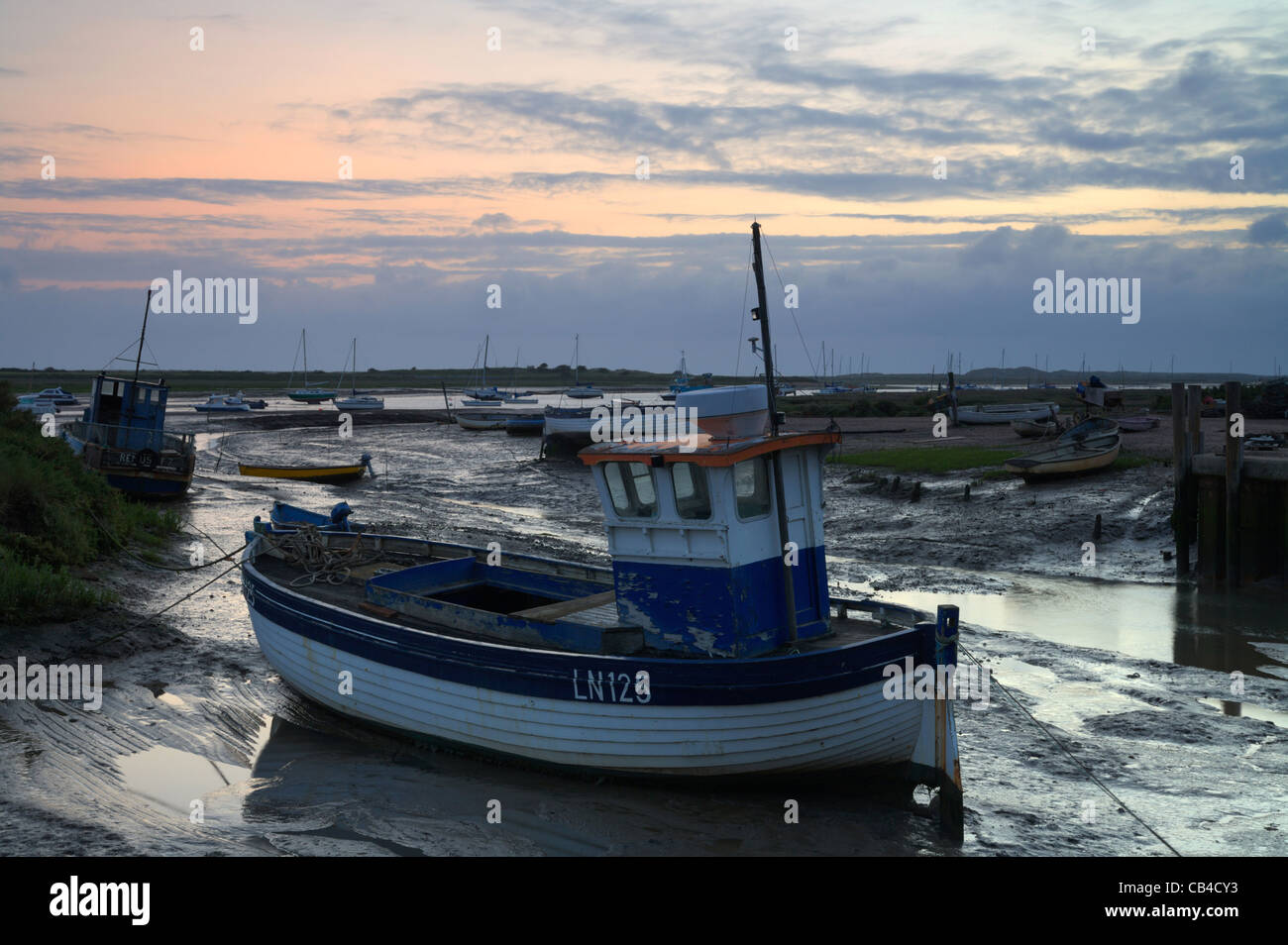 Brancaster staithe fishing boat sitting hi-res stock photography and ...